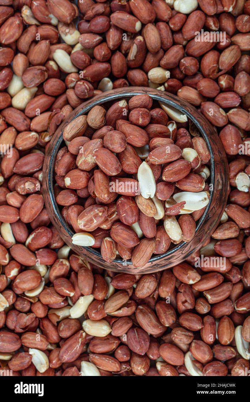 Peanut snack groundnut background pattern. Closeup whole peanut ...