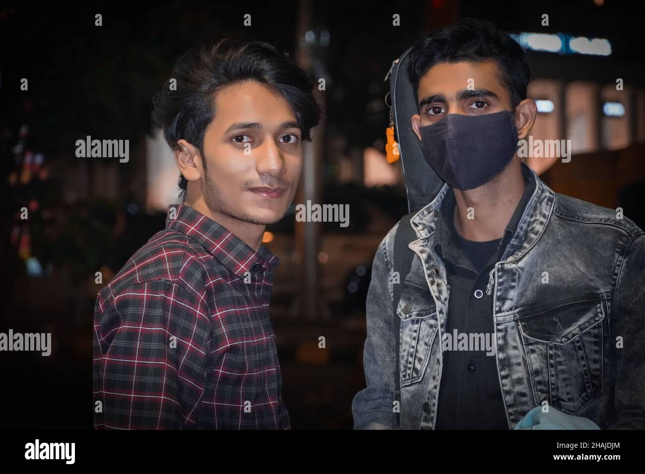 Young adult brothers at outdoor shoot Stock Photo - Alamy