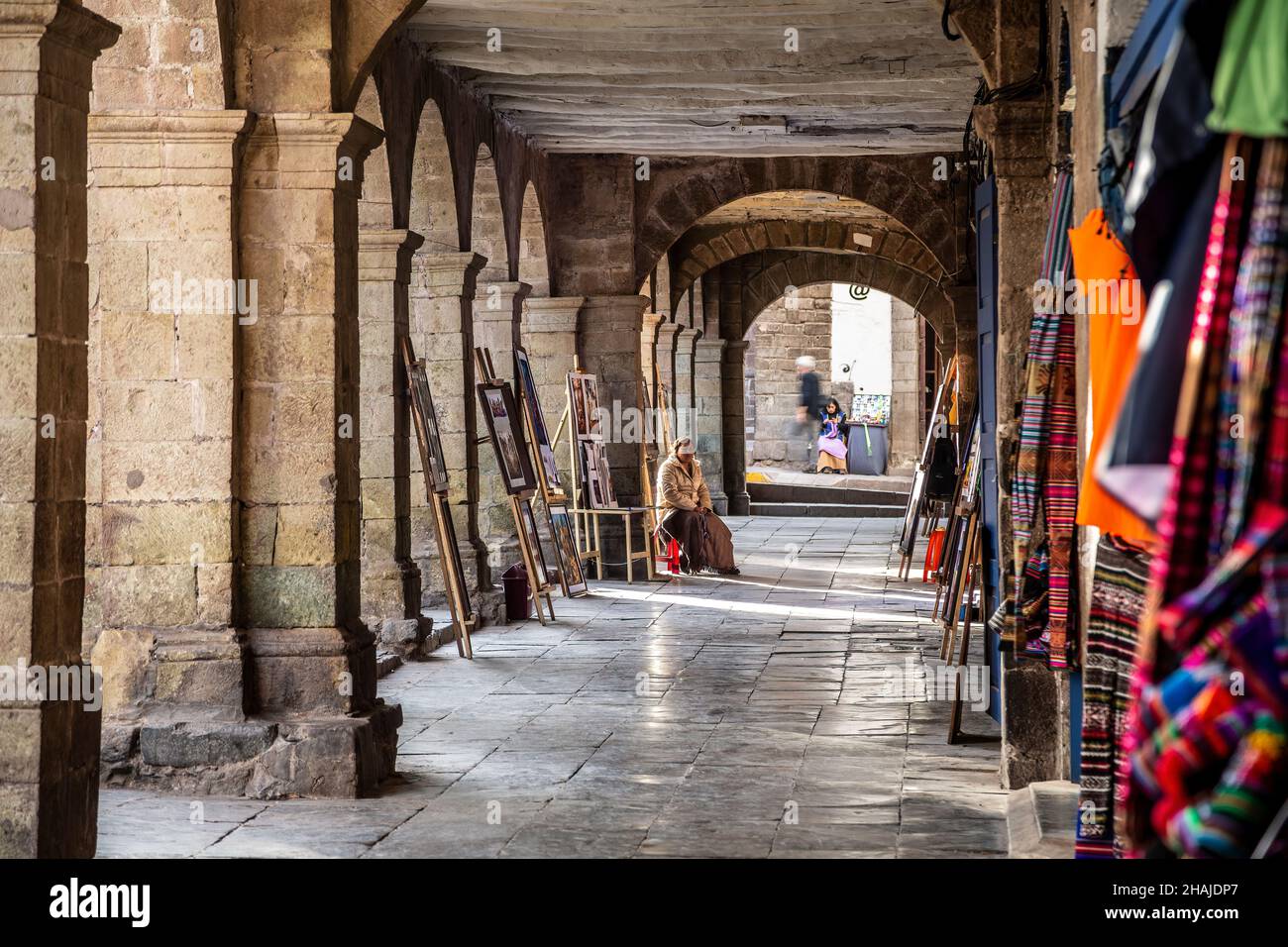 Arched arcade and souvenir stall, near Plaza Regocijo, Cusco, Peru ...