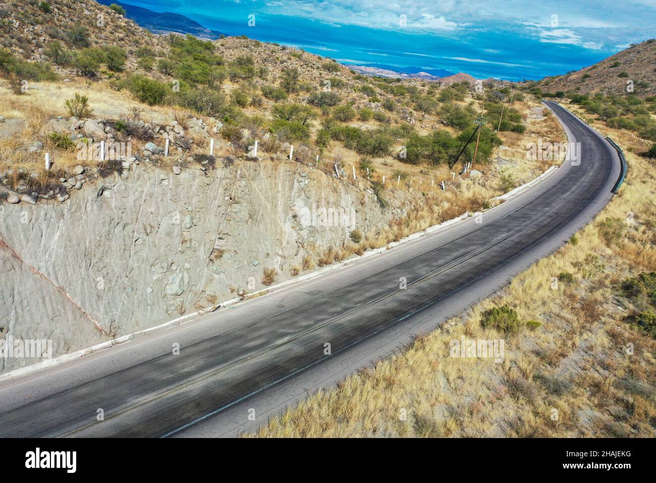 Aerial view of the landscape of the mountains and the road that goes ...