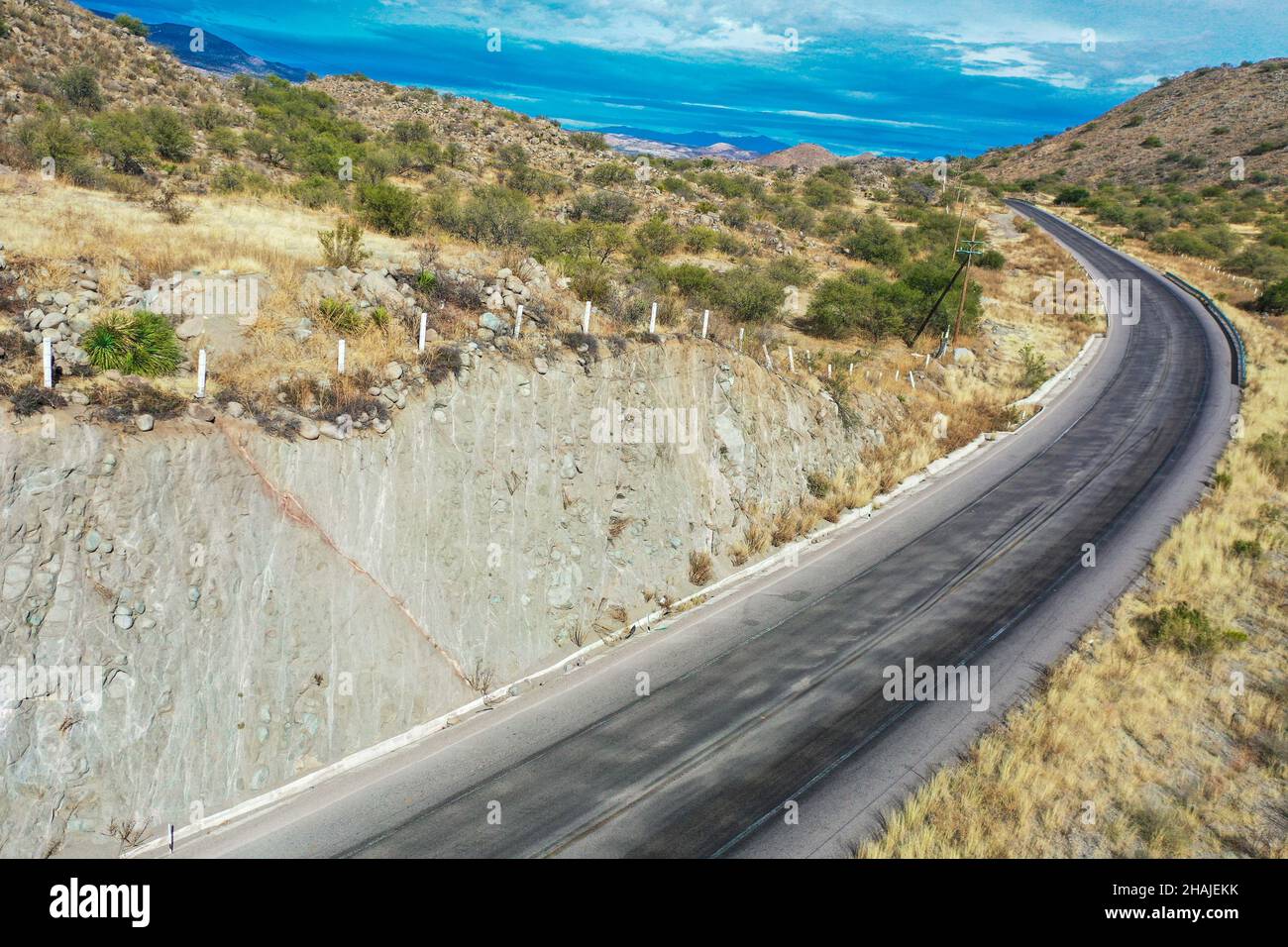 Aerial view of the landscape of the mountains and the road that goes ...