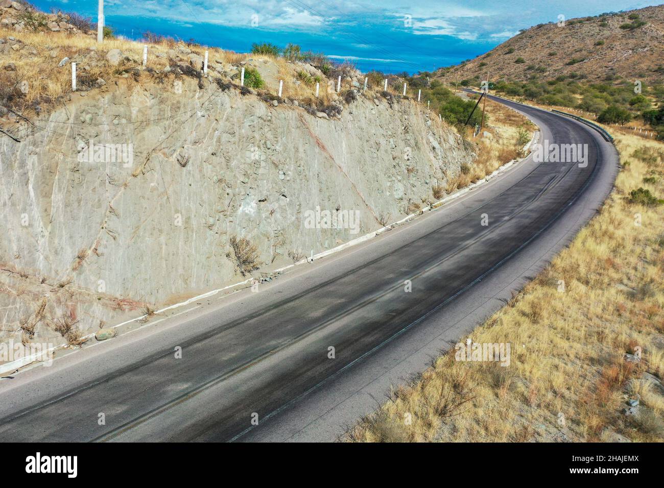 Aerial view of the landscape of the mountains and the road that goes ...