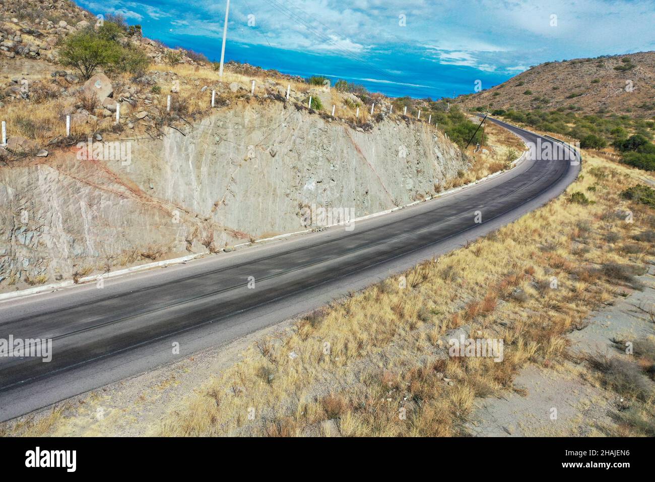 Aerial view of the landscape of the mountains and the road that goes ...