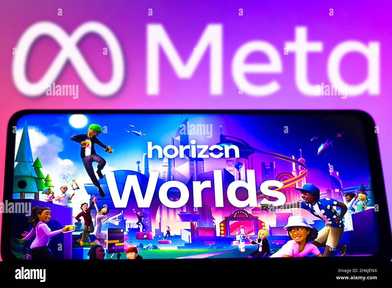 In this photo illustration the Horizon Worlds logo seen displayed on a smartphone and in the ...