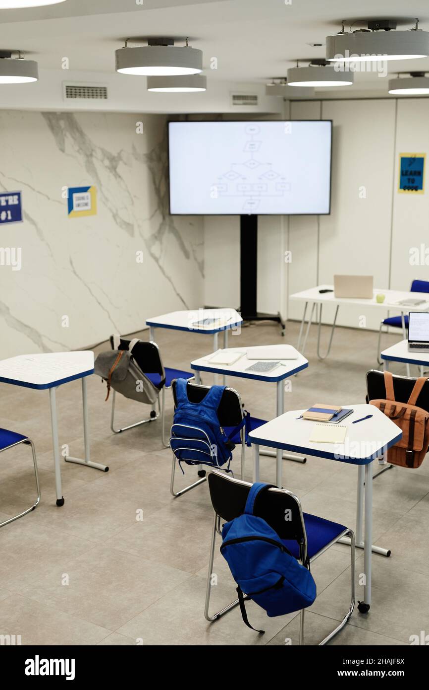 Vertical background image of programming classroom in modern school ...