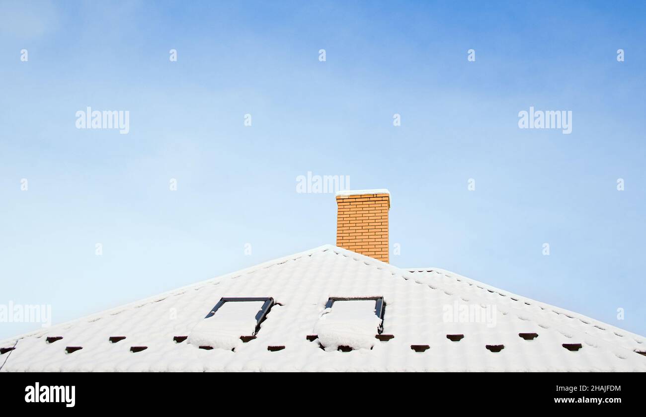 Close up chimney on the roof. Winter Stock Photo - Alamy