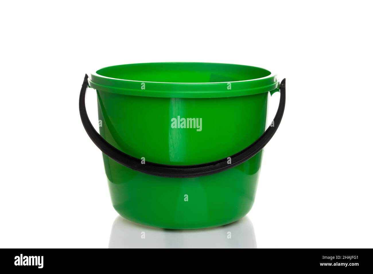 empty plastic green bucket with black handle on white isolated ...