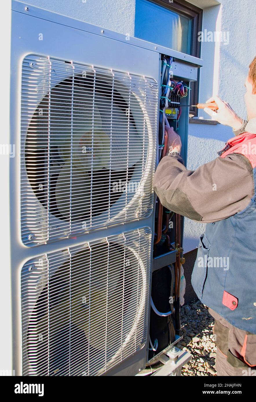 Installation of a heat pump in a residential building Stock Photo - Alamy