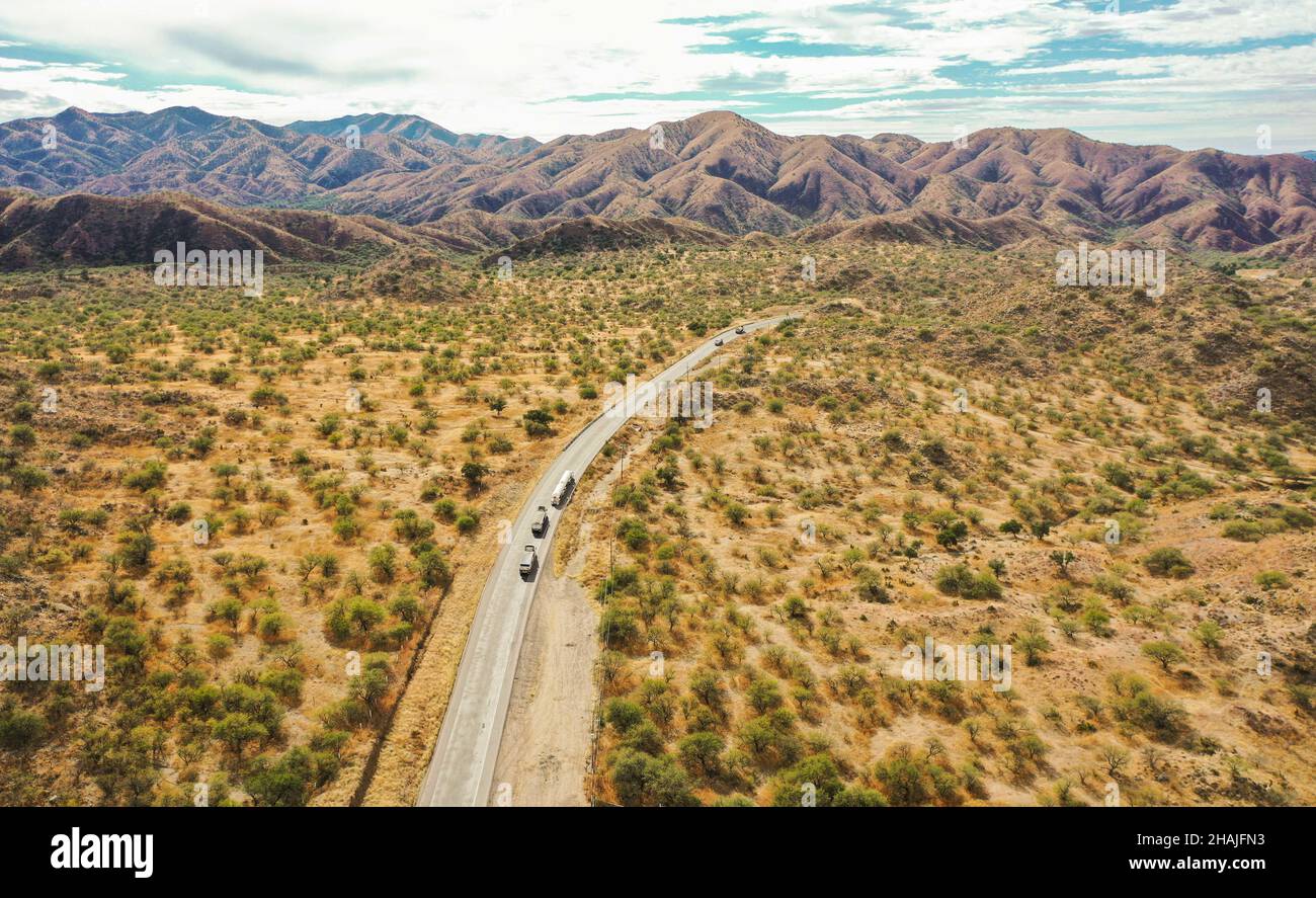 Aerial view of the landscape of the mountains and the road that goes ...