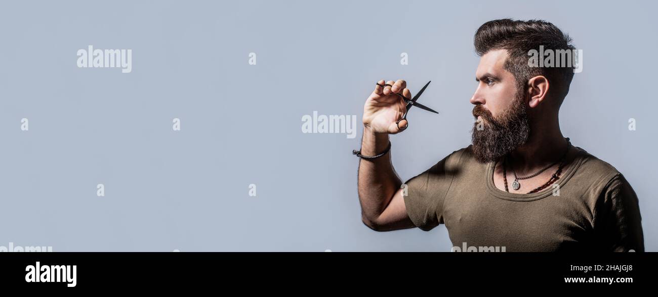 Male in barbershop, haircut, shaving. Bearded man isolated on gray ...