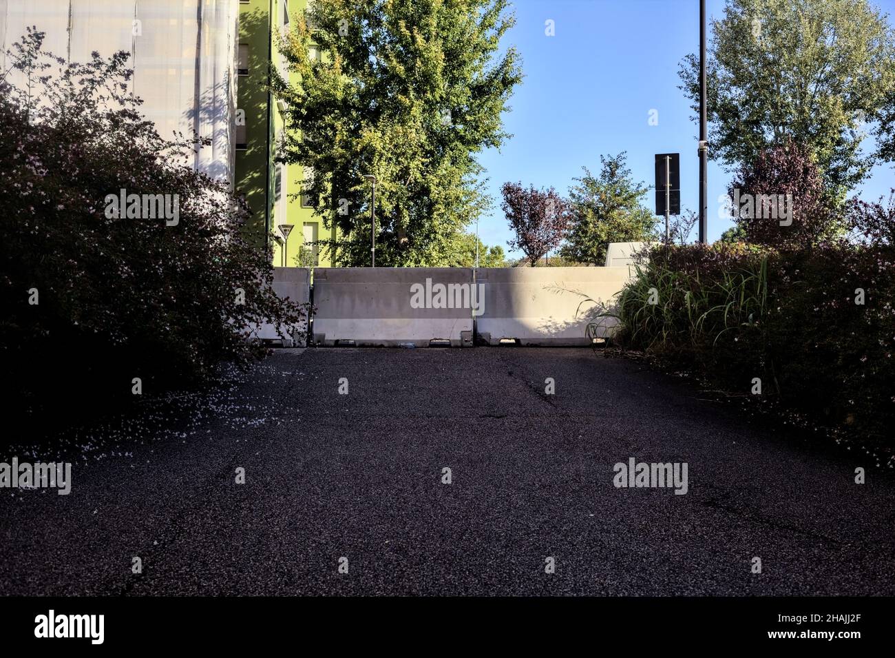 Blocked passage in a residential area with a building under maintenance ...