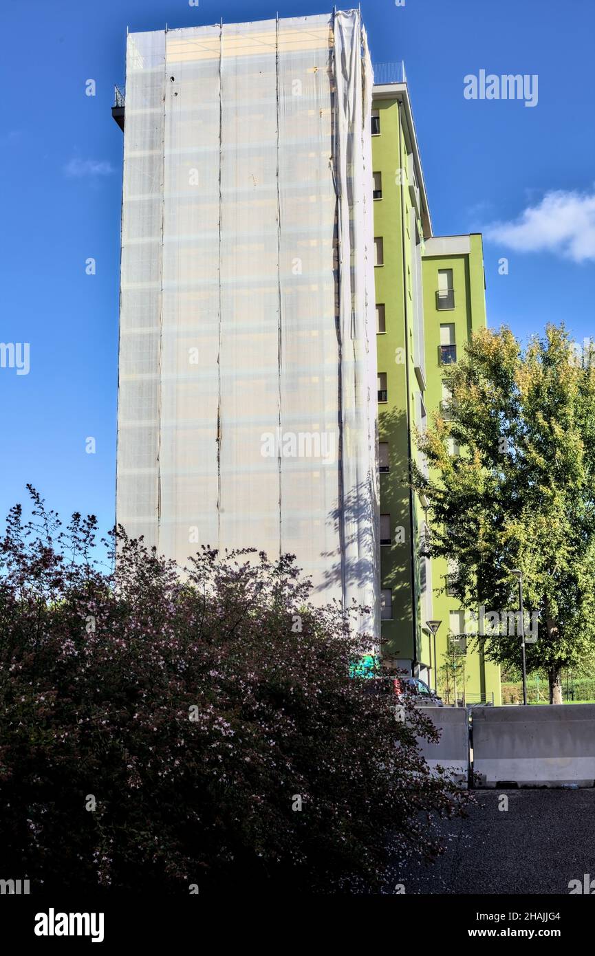Blocked passage in a residential area with a building under maintenance ...