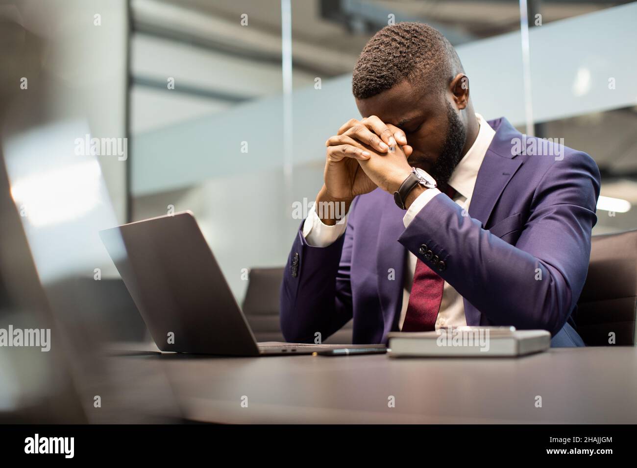 Stressed african american businessman in suit having burnout Stock ...
