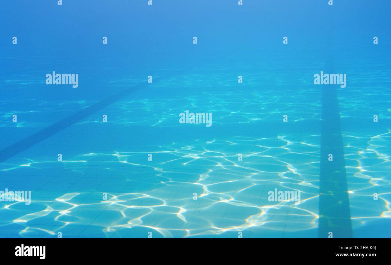 Empty swimming pool, dark lanes marks visible floor, underwater photo ...