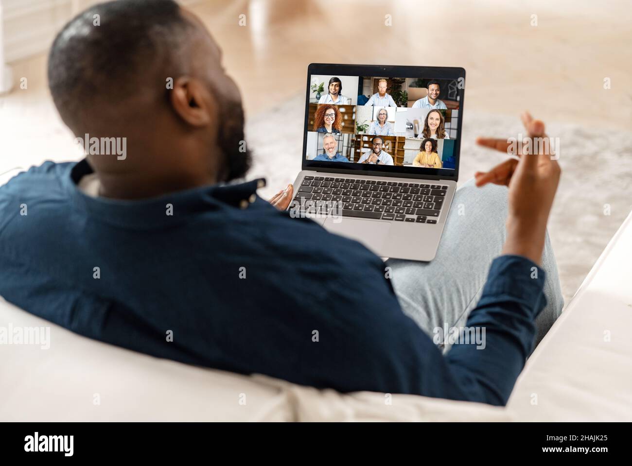 Brainstorming and virtual discussing with work group. African-American ...