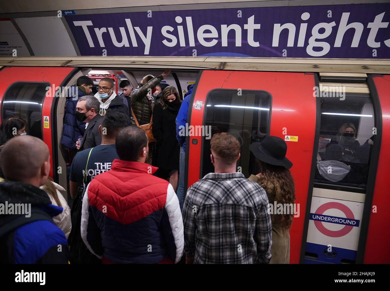 Commuters on the eastbound Central Line platform at Oxford Circus ...