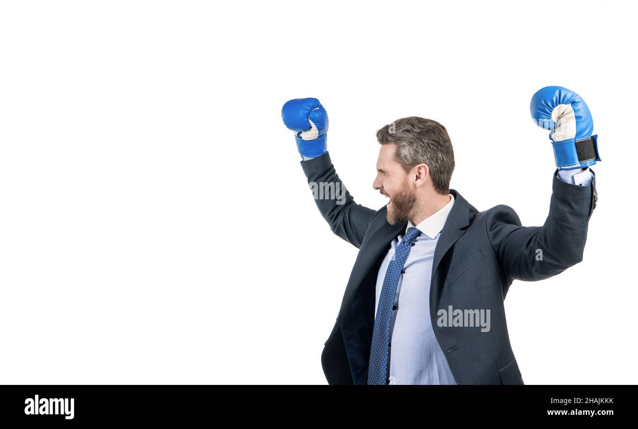 Commitment to success. Professional man raise hands in boxing gloves ...