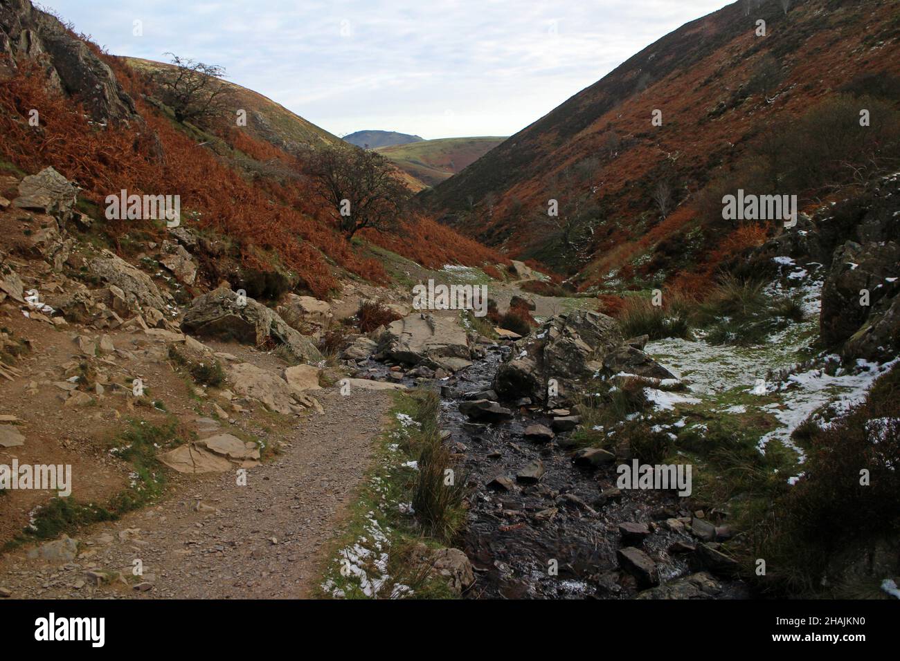 Views of Caer Caradoc from the path with stream leading up to the ...