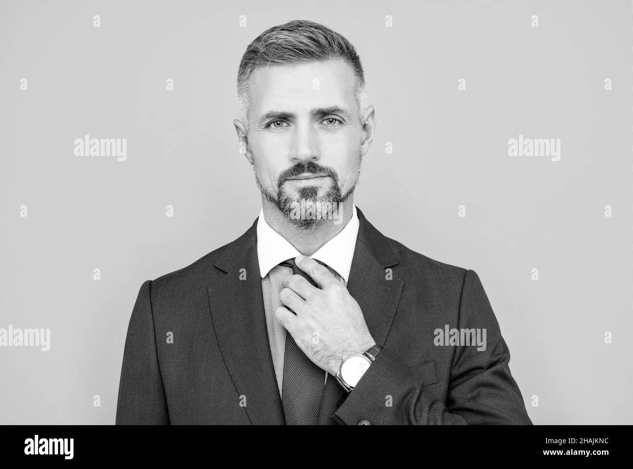 Grey hair man suit hi-res stock photography and images - Alamy