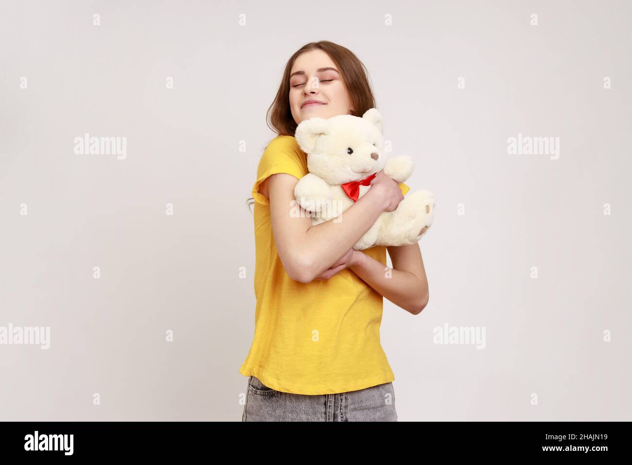 Teenager hugging white background hi-res stock photography and images ...