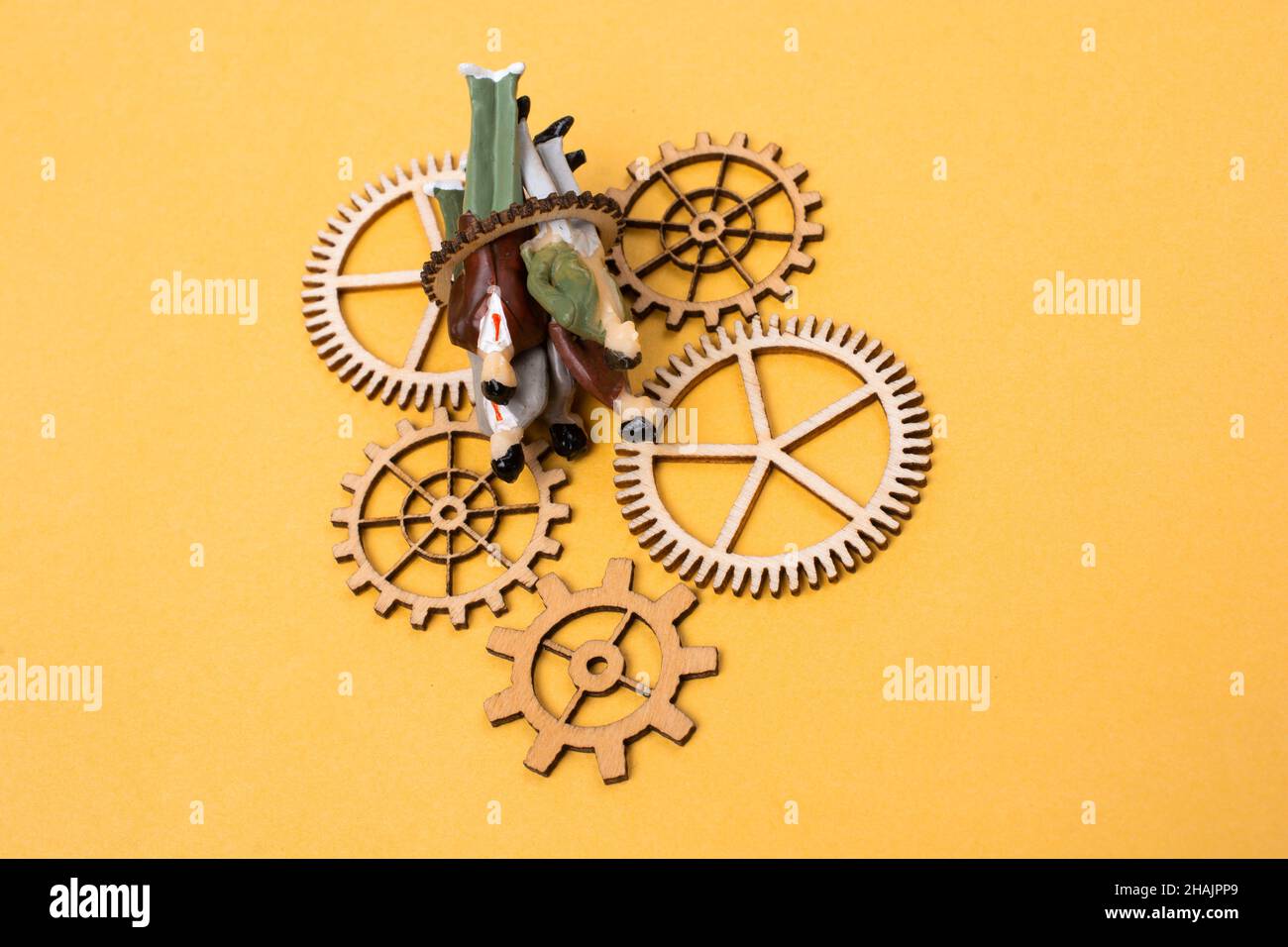 Colorful diverse miniature people figurines make crowd on ground Stock ...