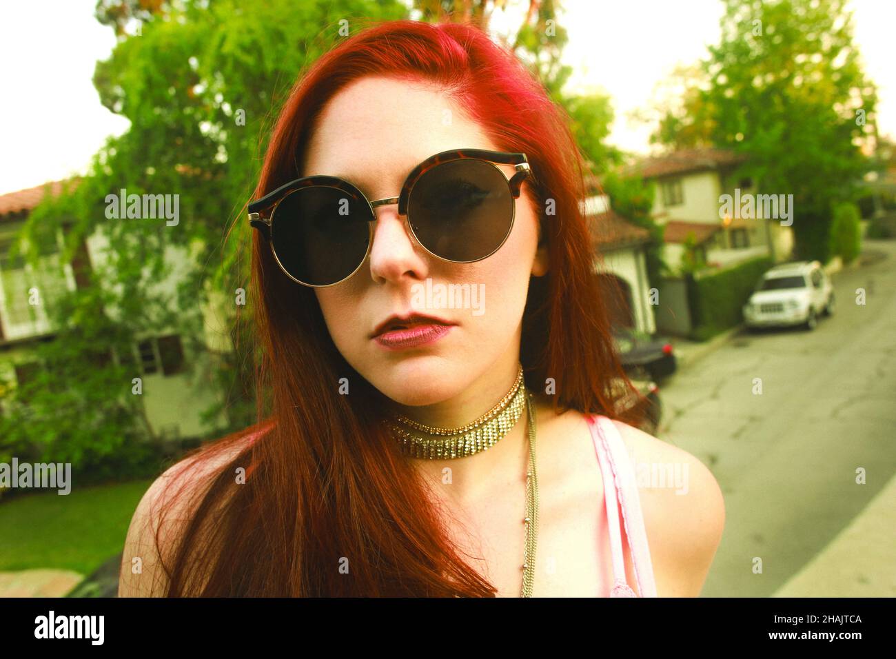 rich girl in sunglasses. wealthy girl. wealthy teen in suburbs. rich ...