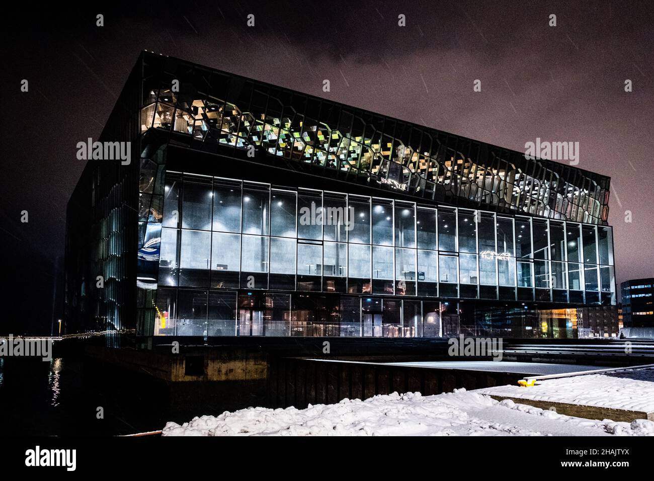 Reykjavik Iceland opera house at night with dramatic lighting lit up ...