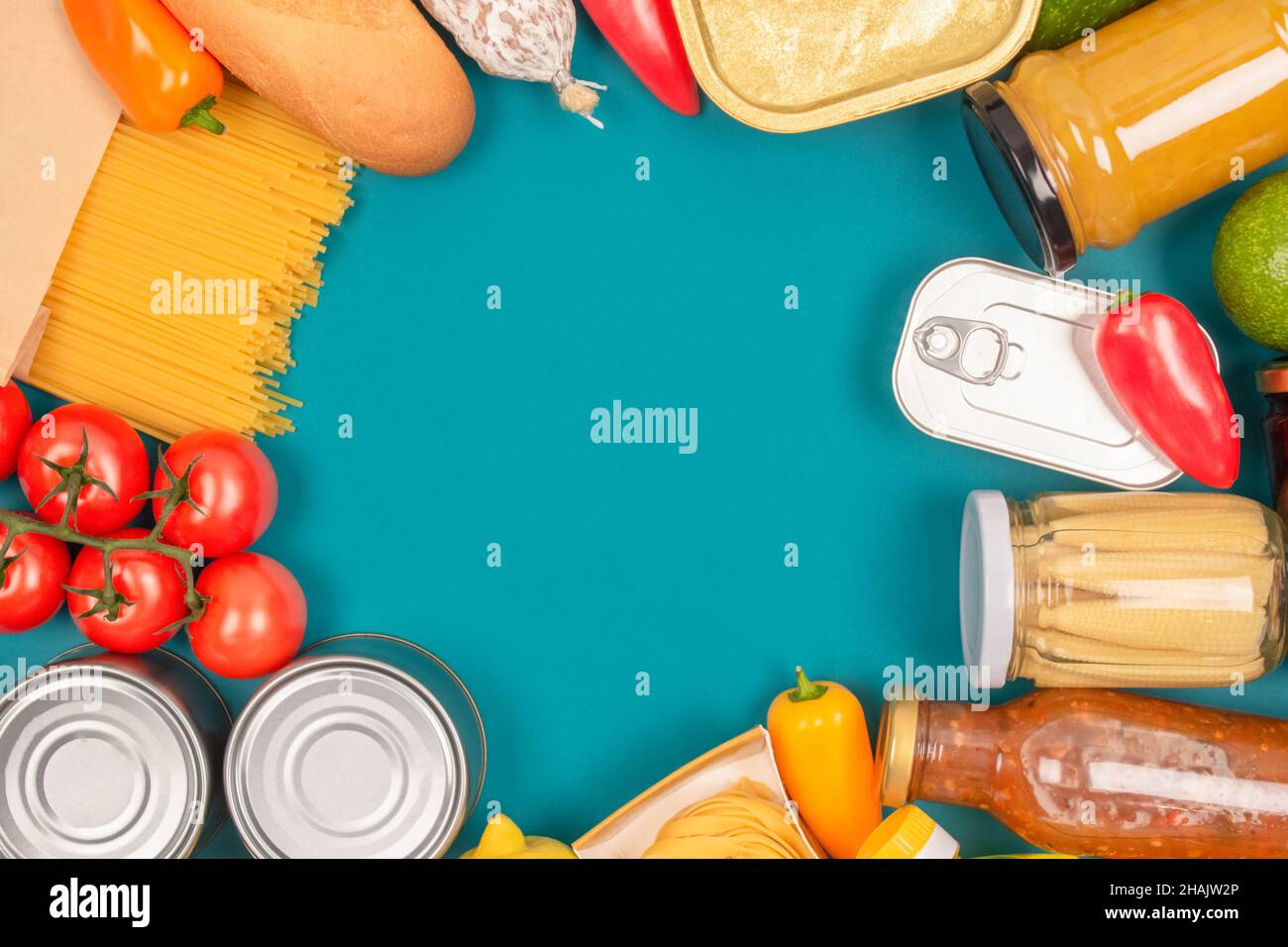Food bank, food delivery concept. Frame made of food donations on green ...