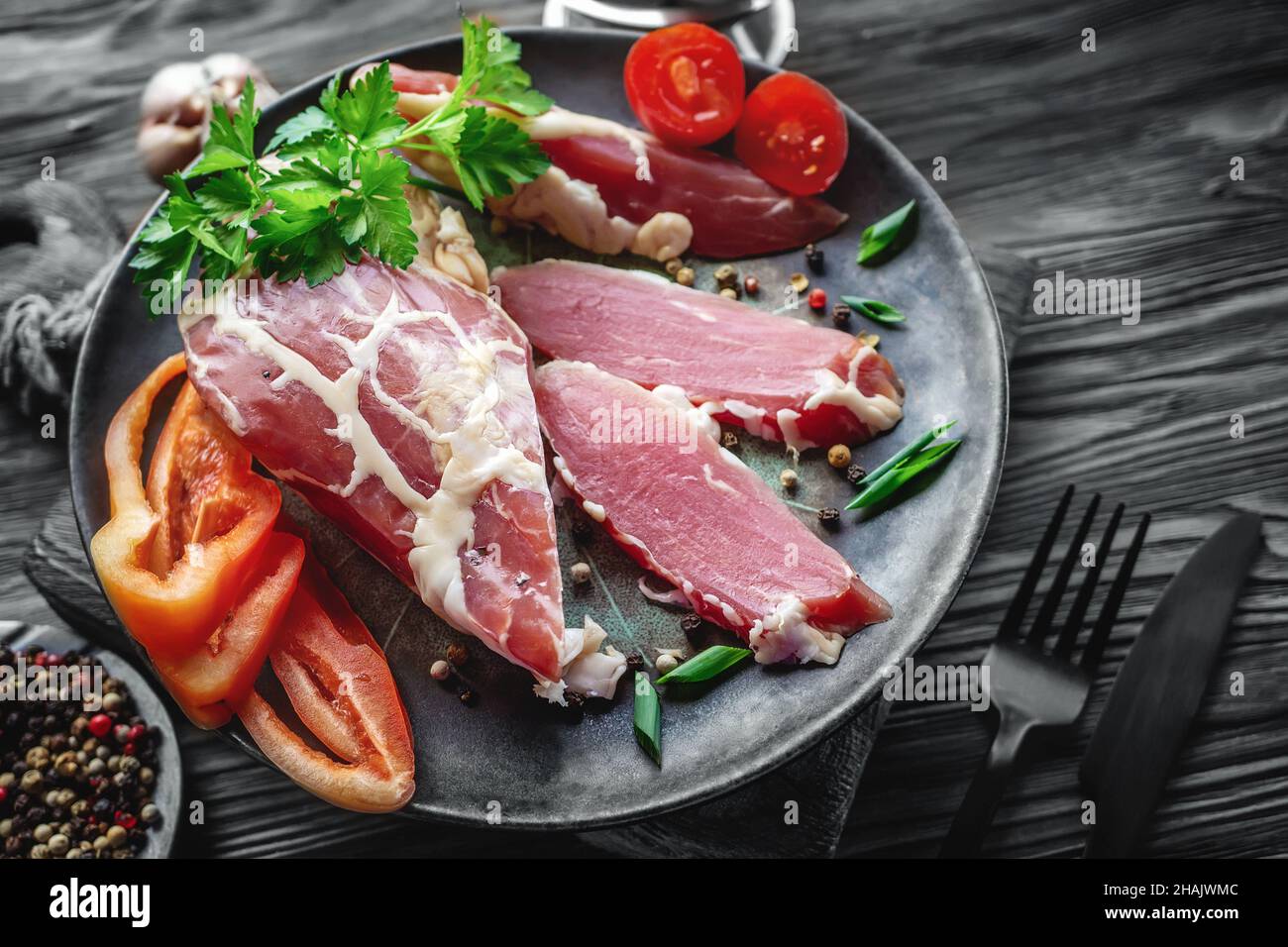 large piece of dried meat in a thin mesh of internal fat. A piece of ...