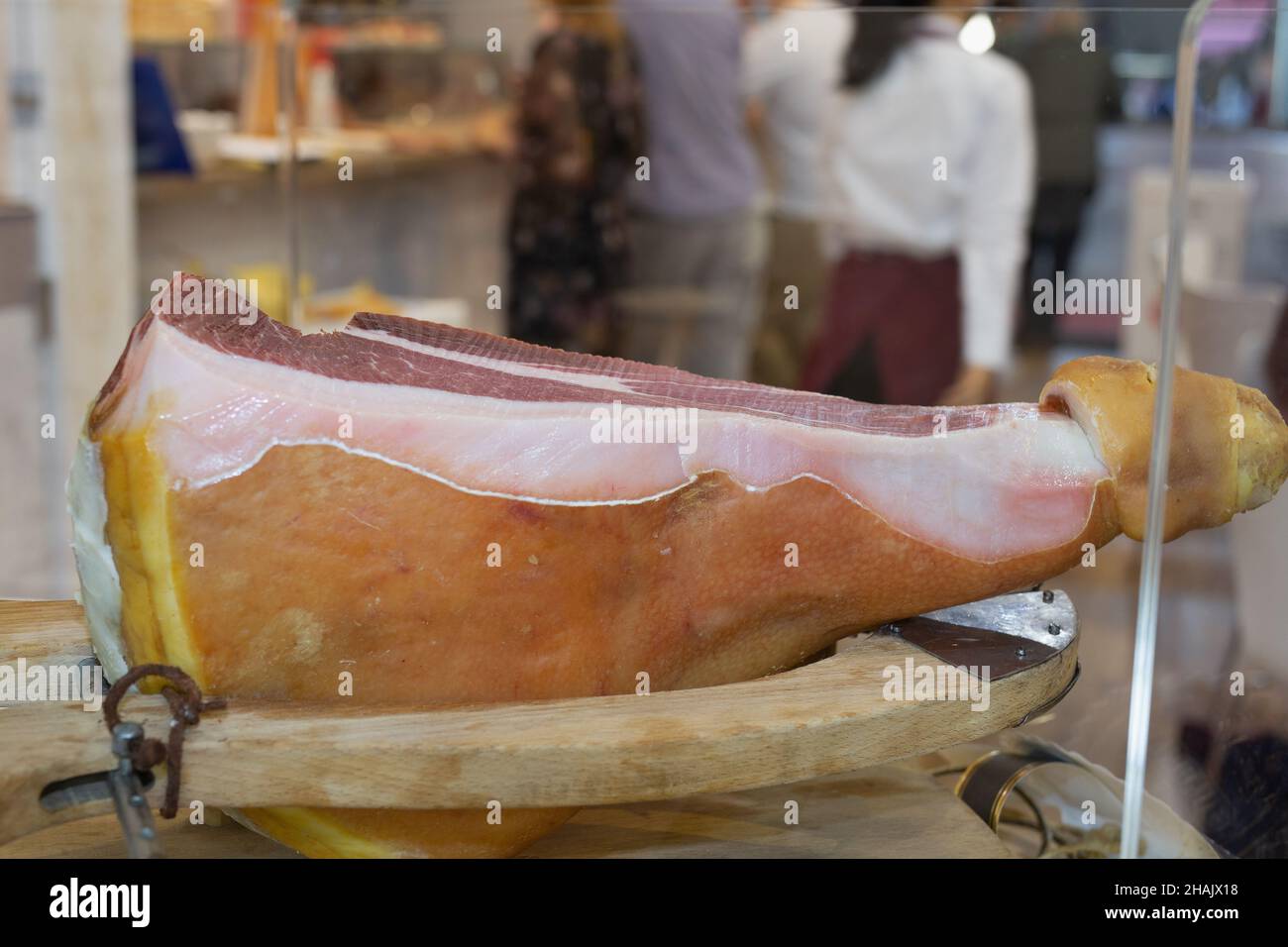 Raw Ham Leg inside Cutting Holder Stock Photo - Alamy