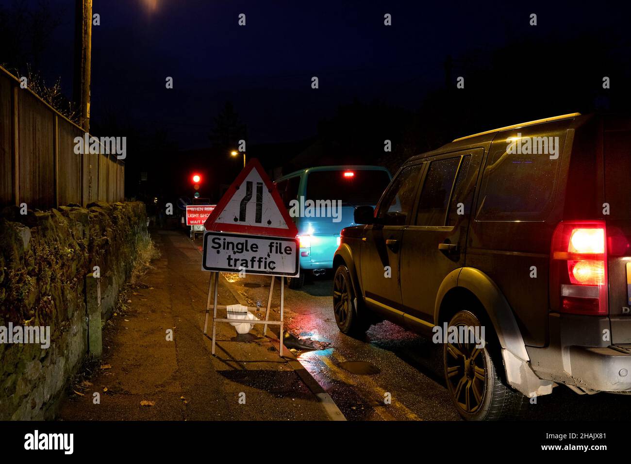December 2021 - Line of vehicles at a temporary red light for road ...
