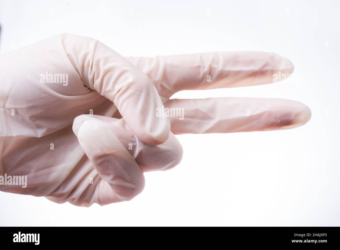 Doctor wearing rubber gloves close hi-res stock photography and images ...