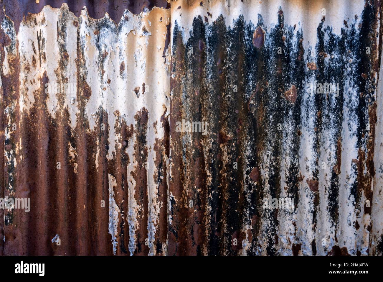 Chipping Paint And Rust On Corrugated Metal Stock Photo - Alamy