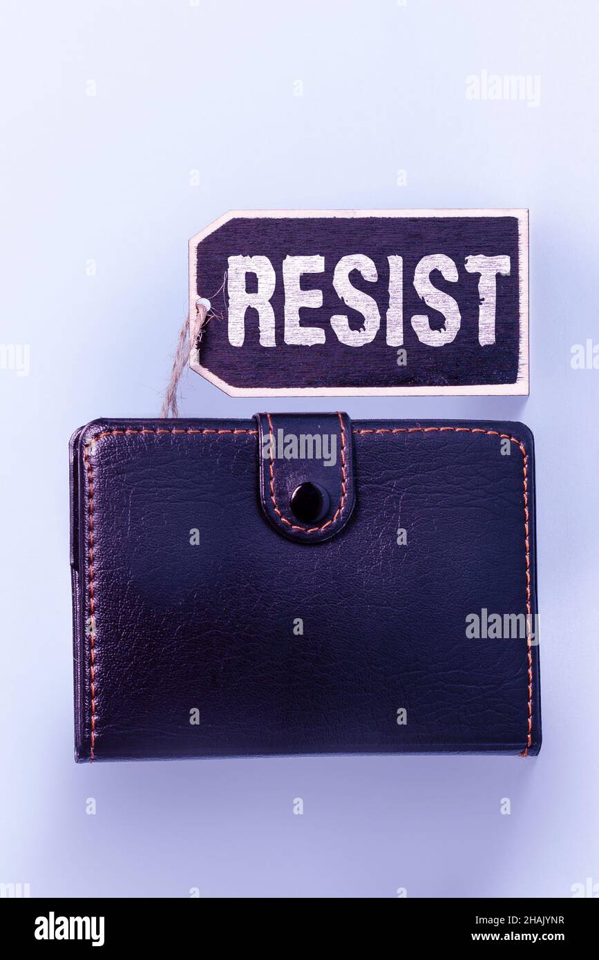 Conceptual caption Resist. Business concept To fight against something ...