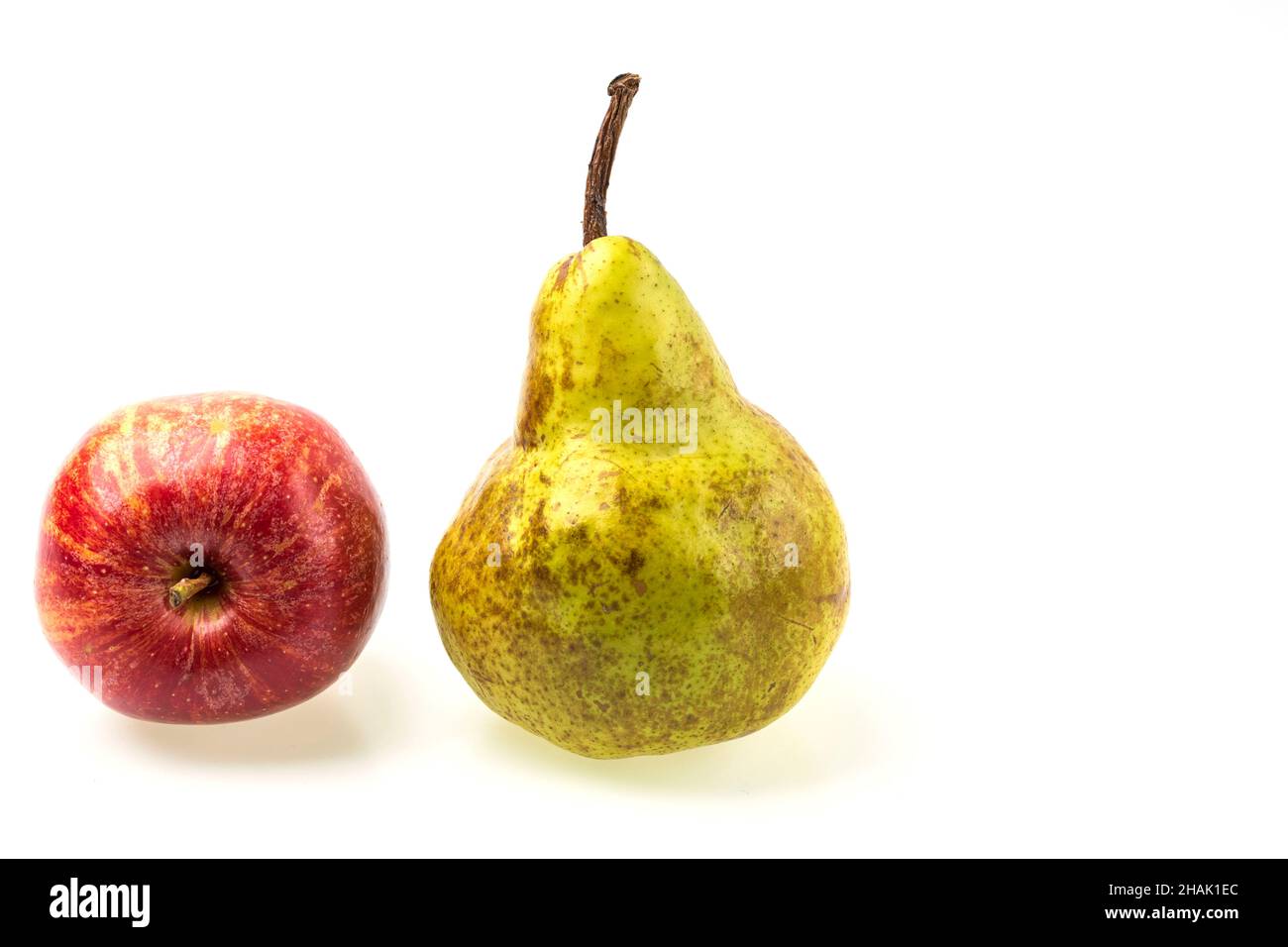 Close up view of red apple and pear isolated on white background Stock ...