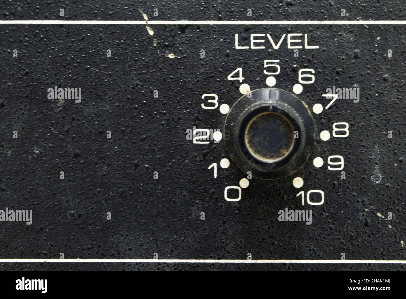 Closeup of a Volume control knob from an old amplifier Stock Photo - Alamy