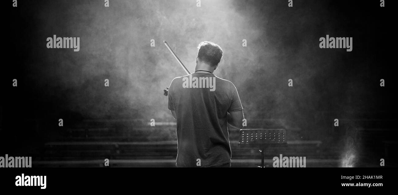 Man stage back view Black and White Stock Photos & Images - Alamy