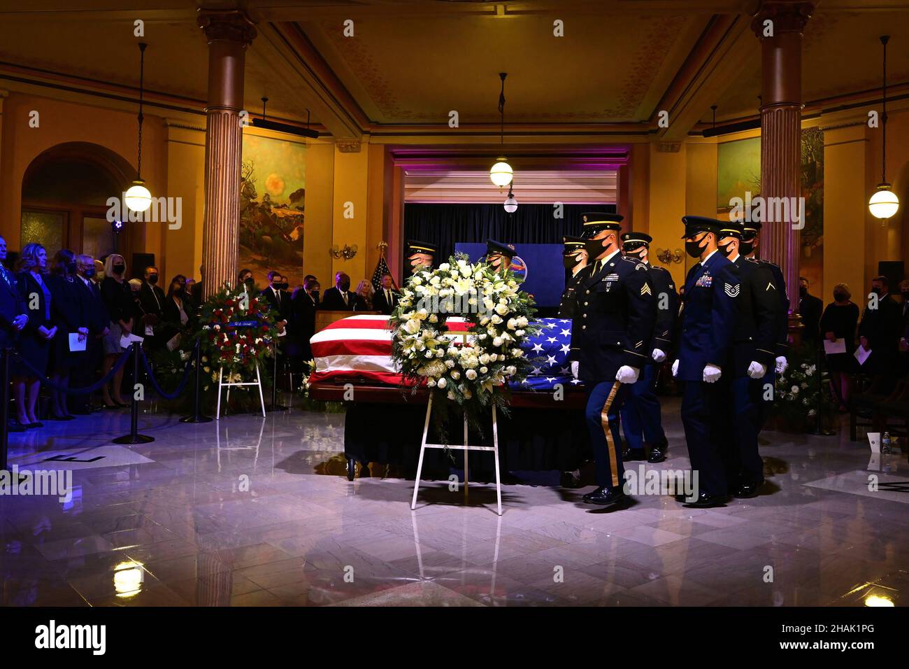 Military pall bearers prepare to carry the casket of Senator Robert ...