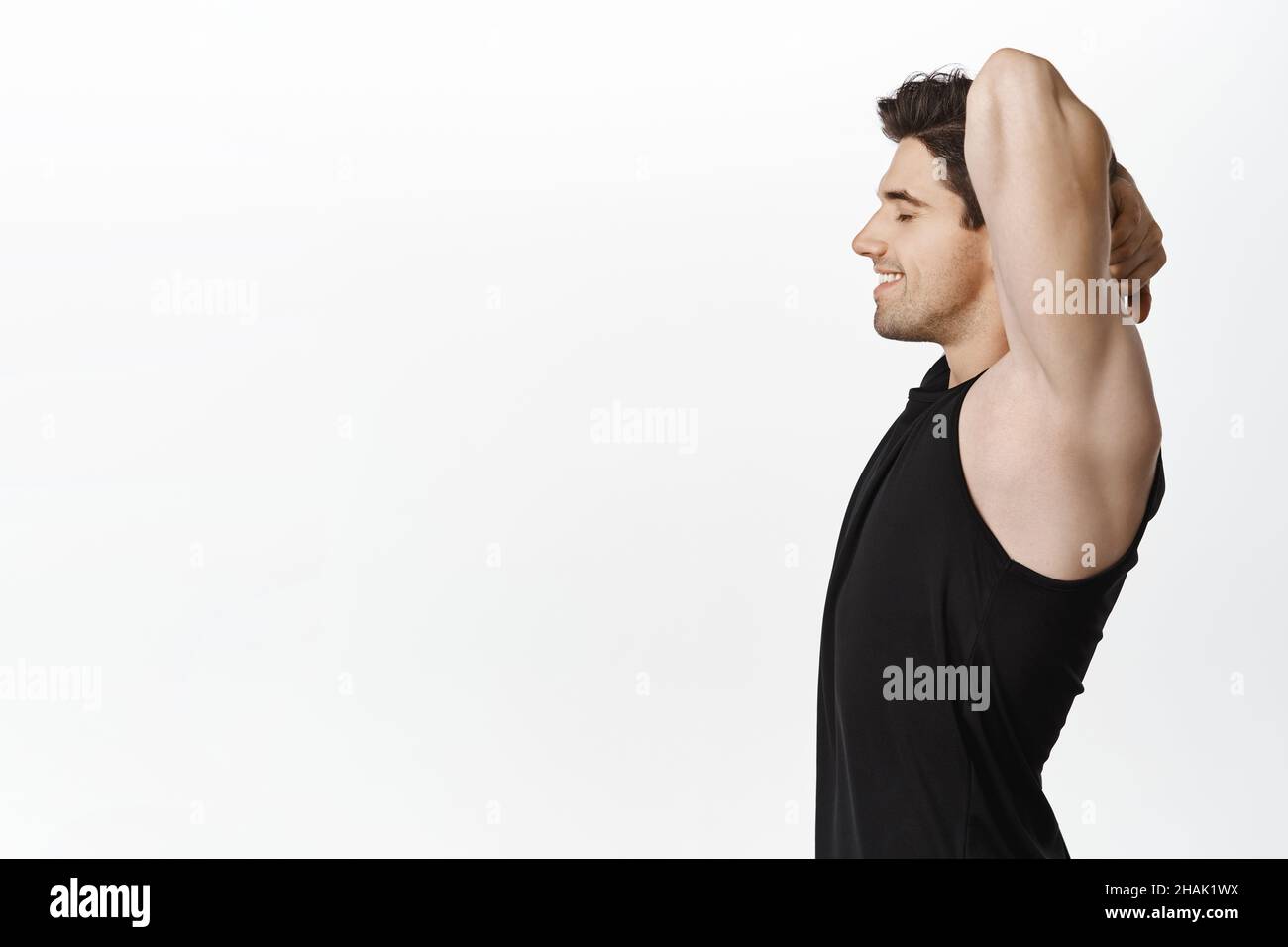 Man stretching arms hi-res stock photography and images - Alamy
