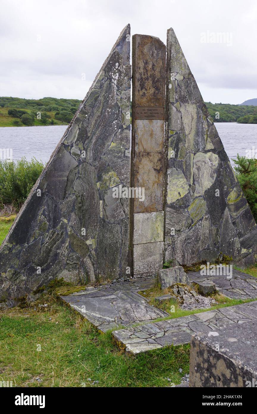 County Galway, Ireland: the marker memorial located behind statue of ...
