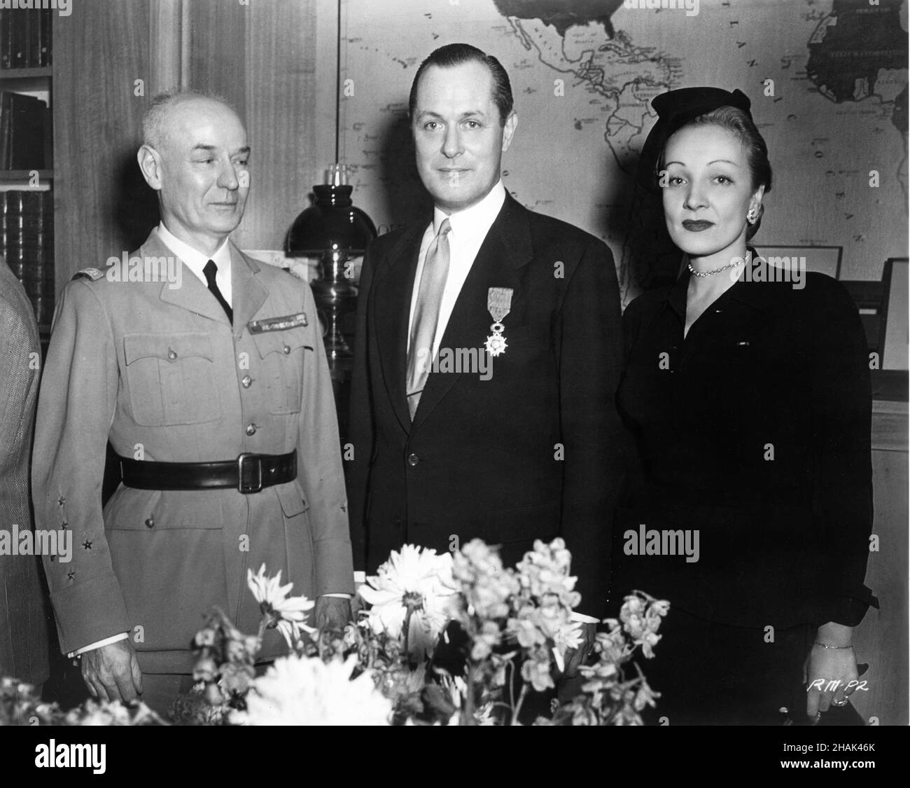 General CHARLES MAST presents ROBERT MONTGOMERY with the French Legion ...