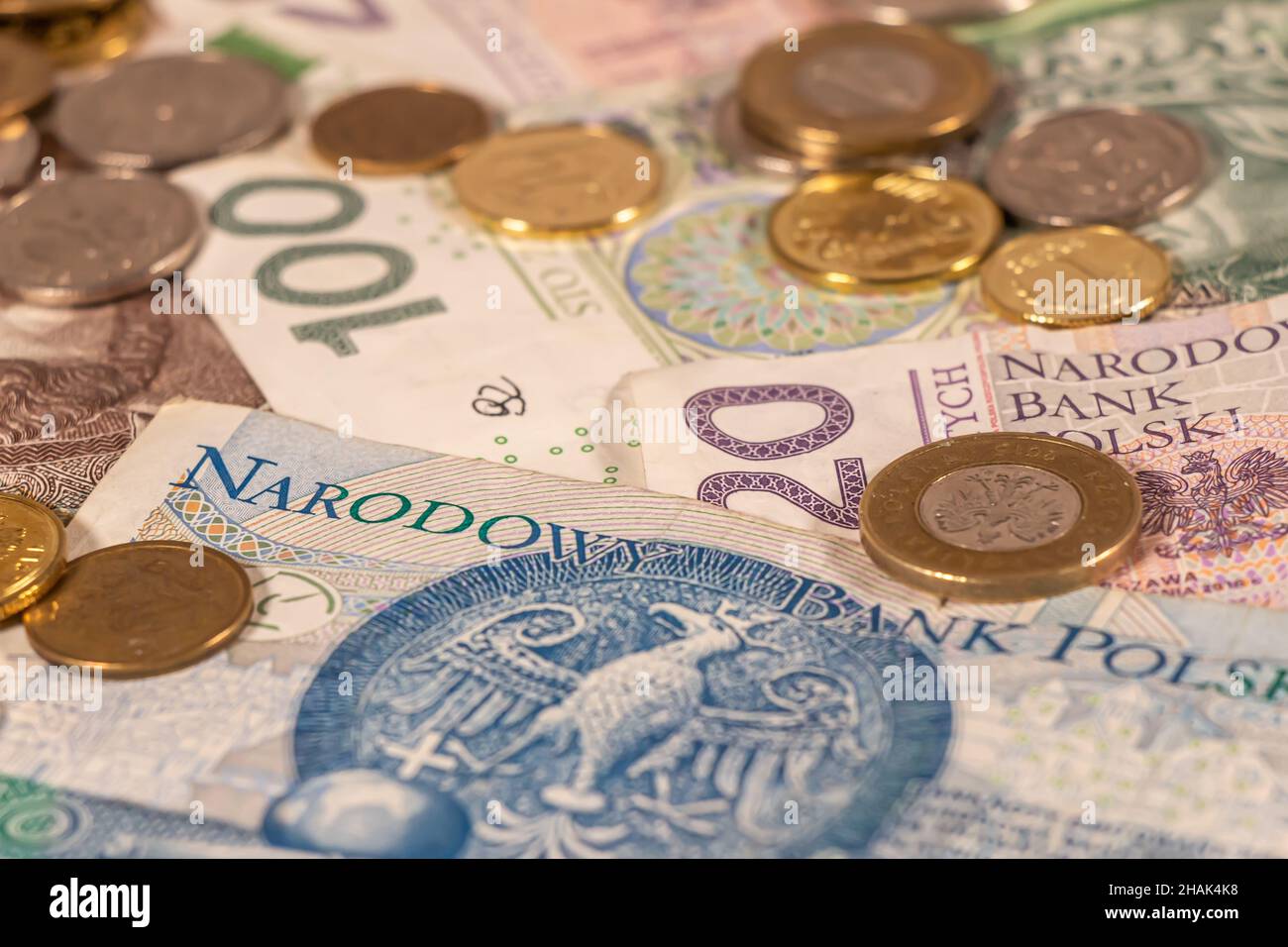 A composition of Polish Zloty. PLN banknotes and coins providing great ...