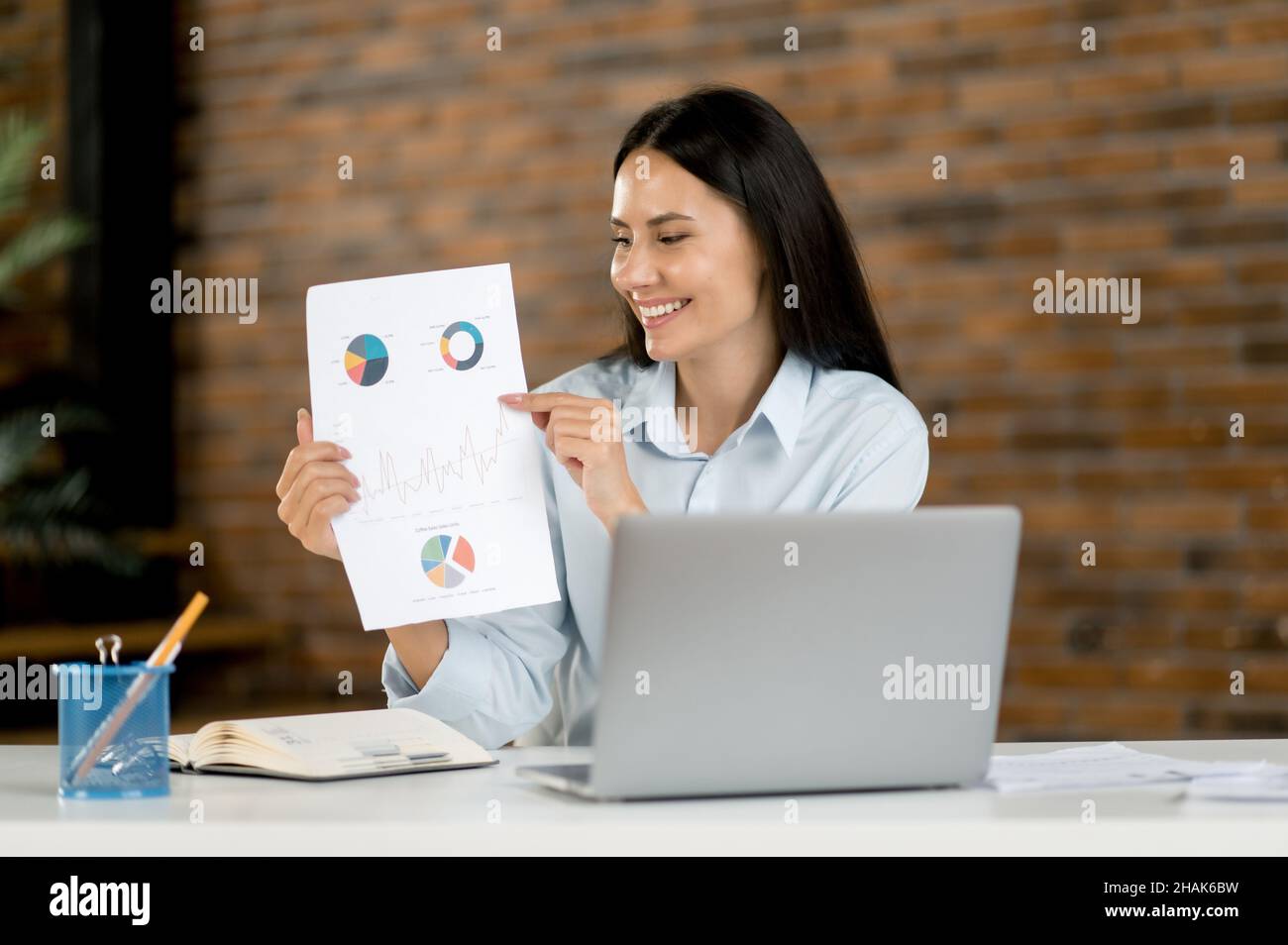 Happy successful attractive business woman, manager or financial mentor ...