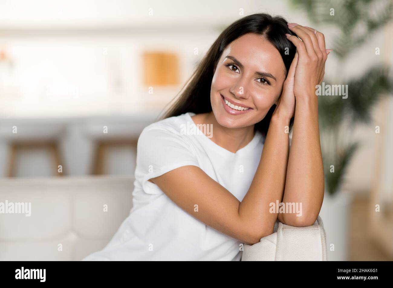 Happy Cute Positive Caucasian Long Haired Brunette Young Adult Woman