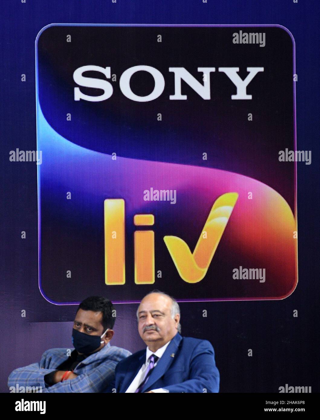 Two men are seen in front of a banner with the Sony liv logo in Mumbai ...