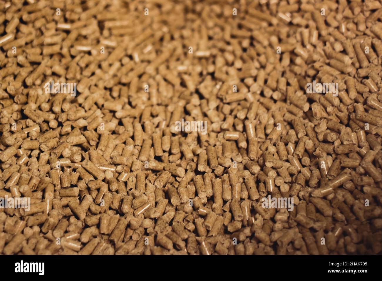 Pile of brown pellet fuel - industrial waste and co-products, food ...