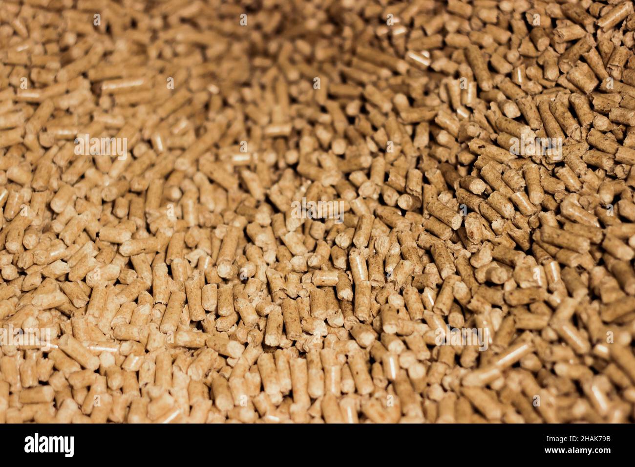 Pile of brown pellet fuel - industrial waste and co-products, food ...