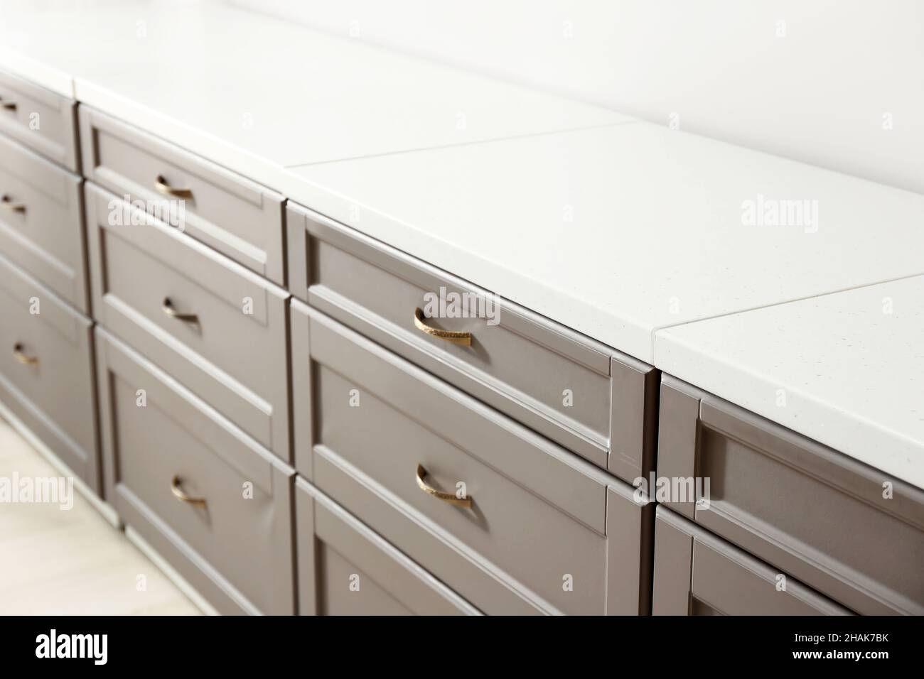 Modern kitchen drawers in light room Stock Photo - Alamy