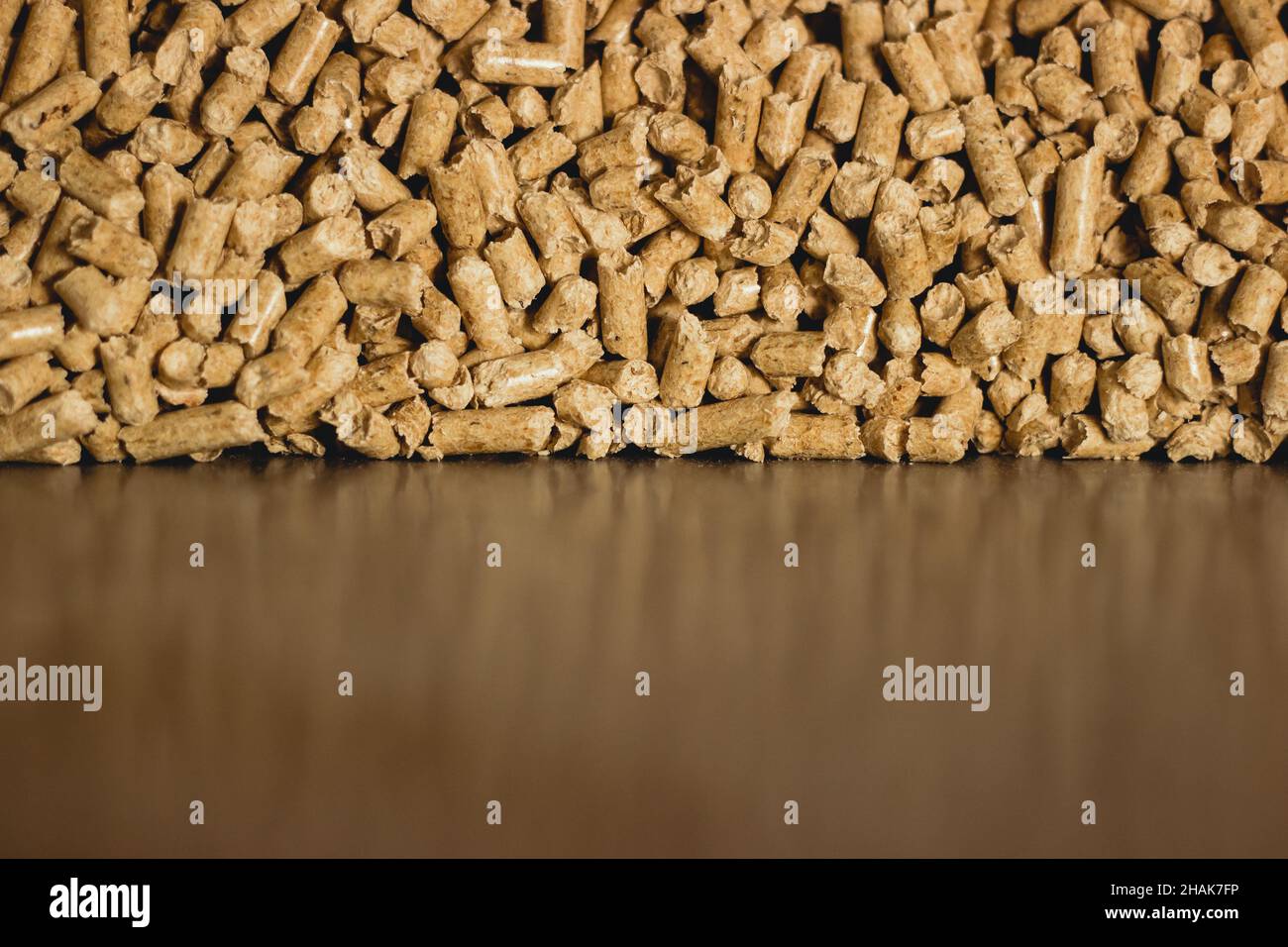 Pile of brown pellet fuel - industrial waste and co-products, food ...