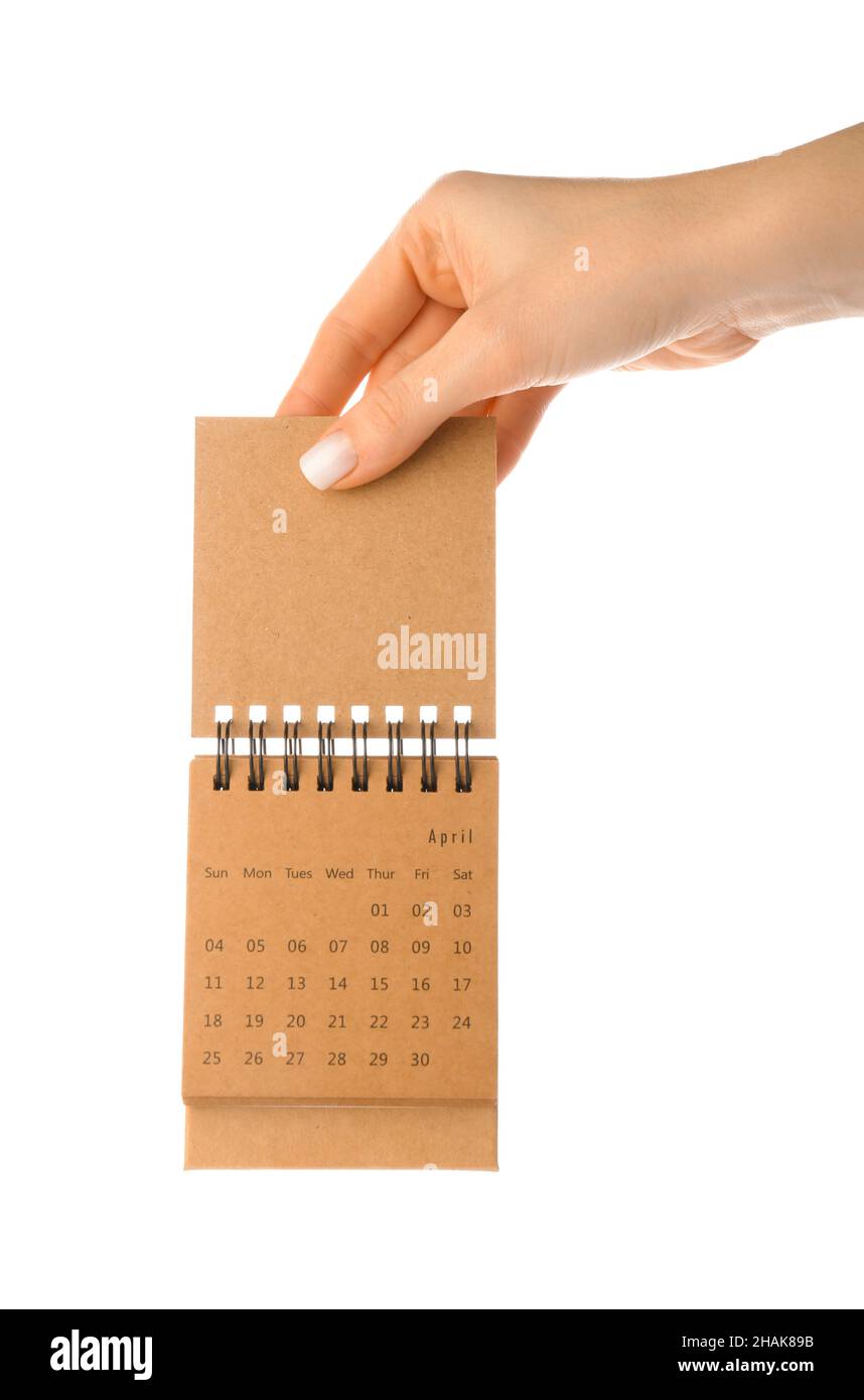 Woman holding craft calendar on white background Stock Photo - Alamy
